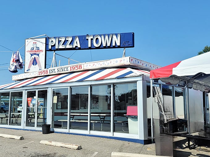 That classic red, white, and blue color scheme promises old-school pizza done exactly right.