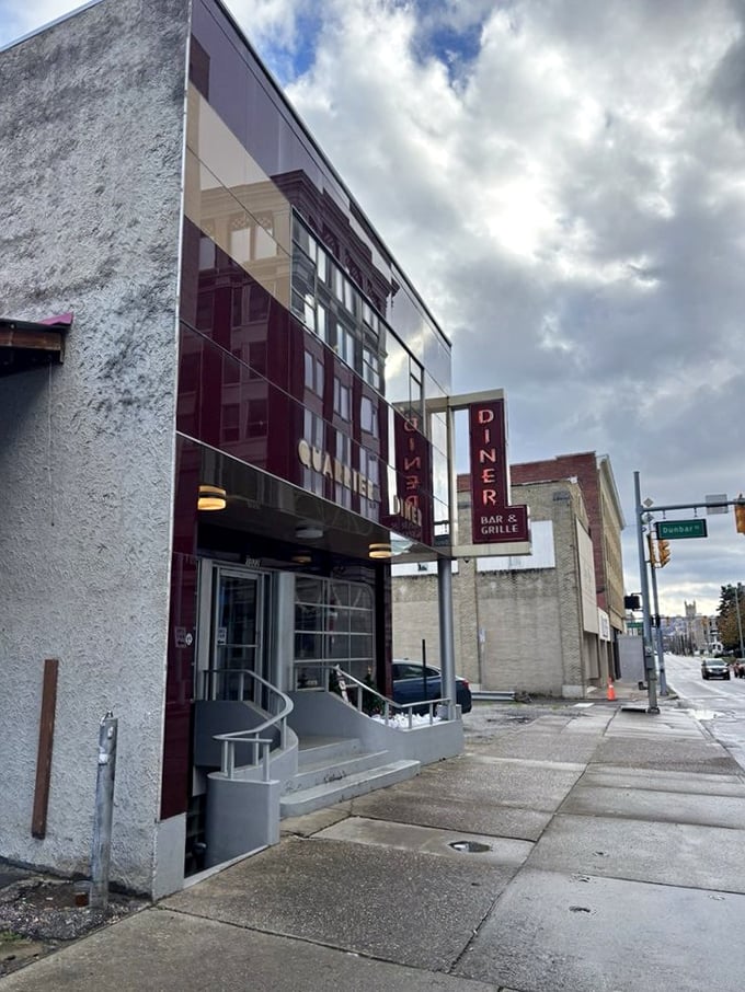 Those purple and white awnings shelter more than just diners – they protect a breakfast sanctuary in downtown Charleston.