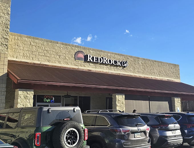 Simple stone and that signature awning – Red Rock Café knows you're here for the views and hearty meals.