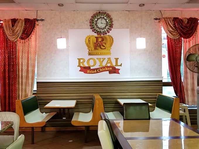 Cozy booths and classic decor at Royal Fried Chicken create the perfect throne room for enjoying crispy, juicy royalty.