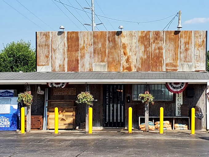 Rusty metal and weathered wood &ndash; nature's way of saying "authentic BBQ inside." Yellow safety poles guard flavor central.