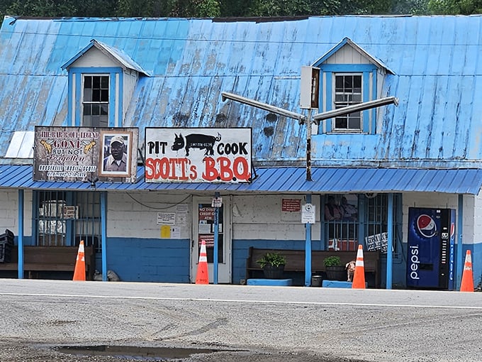 The faded blue paint and hand-painted sign at Scott's speak of authenticity. No Instagram filters needed for this genuine barbecue landmark.