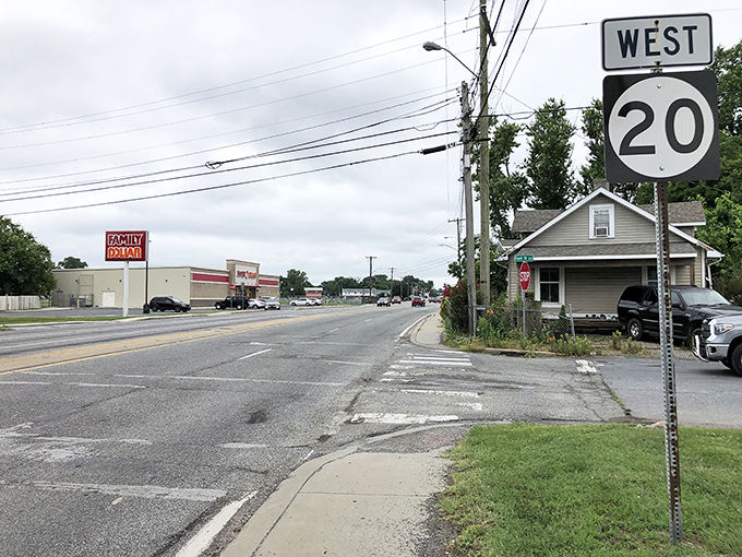 Route 20 stretches into the distance, where small-town Delaware shows its practical side. Family Dollar stands as a reminder that even getaway towns need everyday essentials!