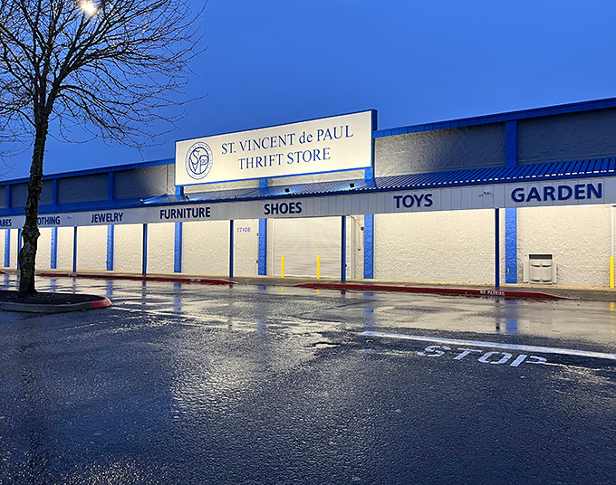 Even in the rain, St. Vincent's storefront promises warm bargains inside. Those blue accents pop against Portland's signature gray skies.