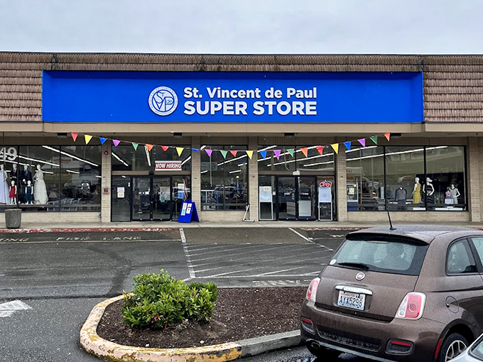 St. Vincent's Super Store welcomes shoppers with festive bunting and well-organized displays. The parking lot is never empty for long at this community favorite.
