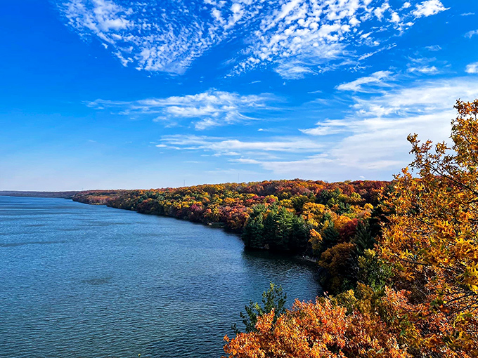 A peaceful lake stretches across Starved Rock&rsquo;s serene landscape &mdash; nature&rsquo;s calm retreat, no inner tubes needed.