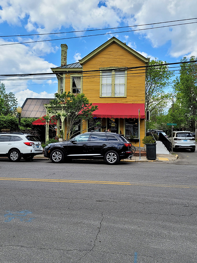 Red awnings and historic charm create the perfect setting for sandwiches that taste like home.