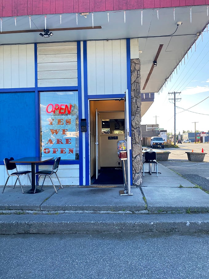 That neon "OPEN" sign and "YES WE ARE OPEN" window declaration &ndash; they're serious about serving Philly authenticity in Alaska.