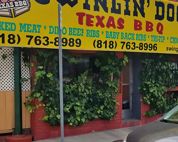 The ivy-covered walls and Texas-sized sign promise BBQ that's worth pulling over for.