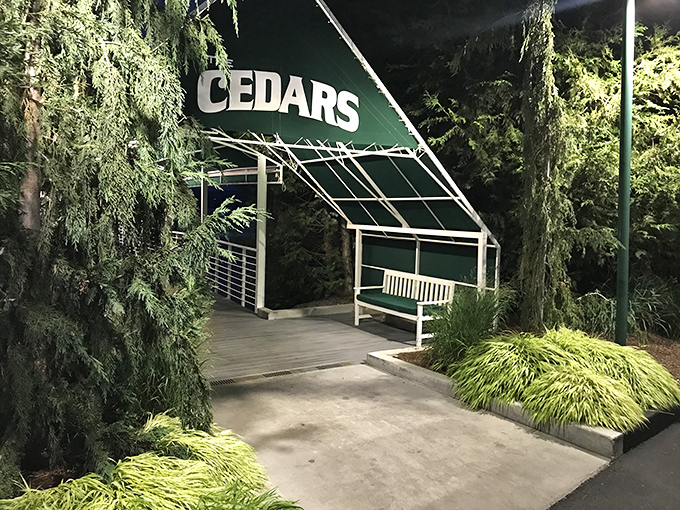 Nestled among towering evergreens, The Cedars' entrance promises dining with a side of Idaho's natural splendor.