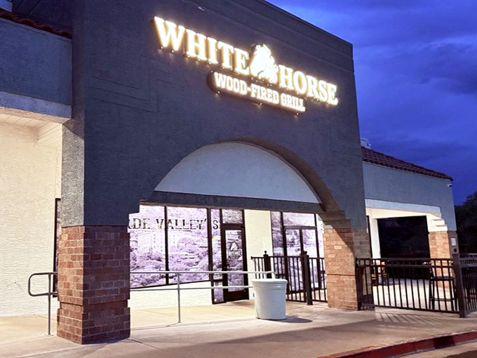 As darkness falls, White Horse Wood-Fired Grill beckons with the promise of smoky, mesquite-kissed steaks. Resistance is futile!