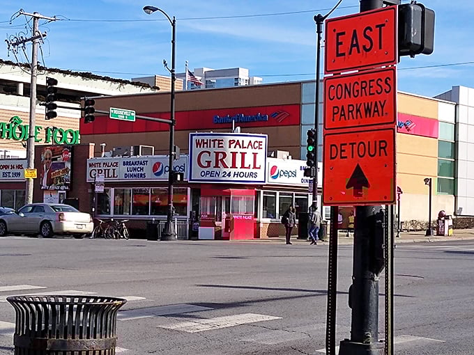 The White Palace Grill stands sentinel at a Chicago intersection, its 24-hour promise of breakfast a comfort to night owls and early birds alike.