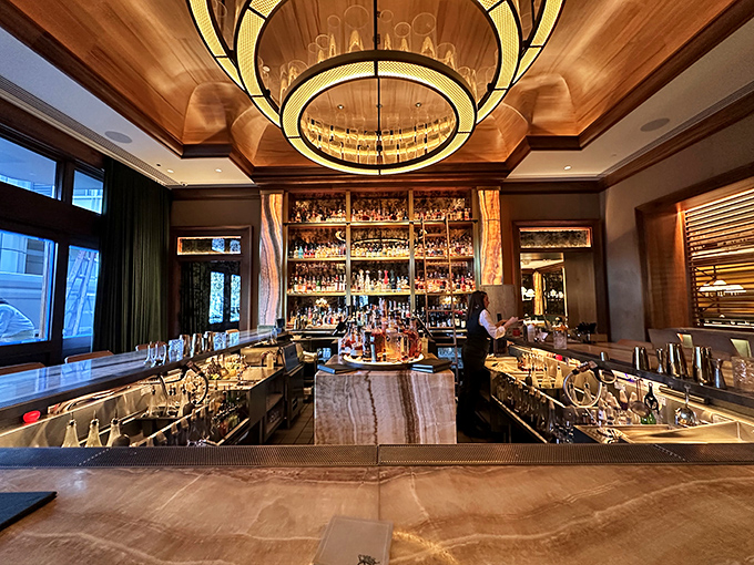 The stunning bar with that gorgeous chandelier sets the stage for steaks that deserve their own standing ovation.