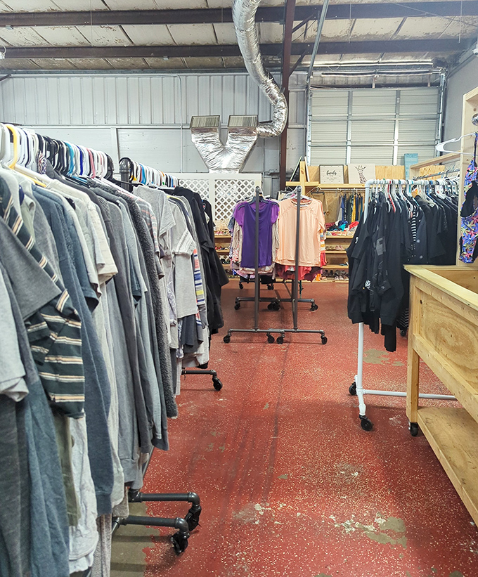 The red floor adds unexpected character to this intimate thrift space. Every rack tells a different style story.