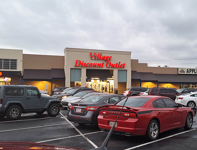 As dusk approaches, Village Discount Outlet still draws shoppers hoping to score that perfect find before closing time.