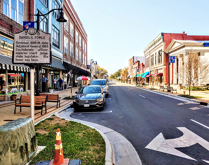 Here's the view of budget-friendly bliss, where gas stations and green spaces coexist in perfect harmony.