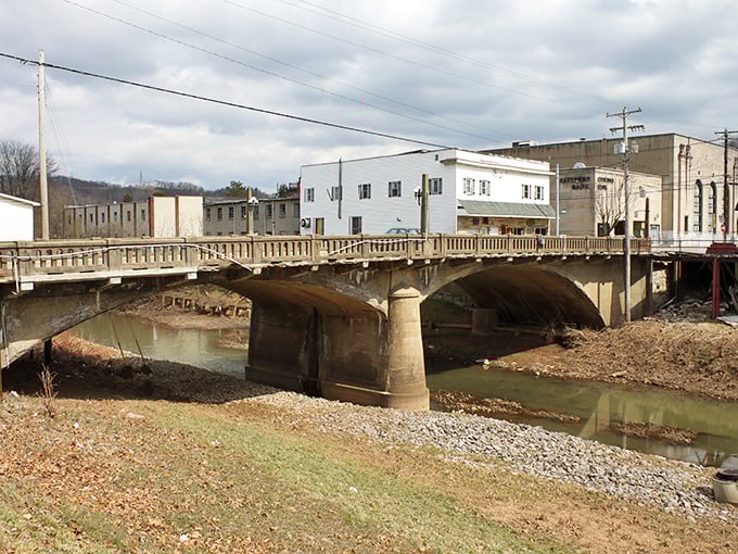 That old stone bridge has probably seen more history pass over it than most modern buildings will ever witness.