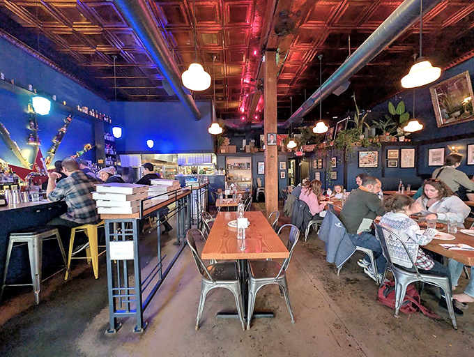 The moody blue interior at Windy City Pie sets the perfect stage for serious pizza contemplation and consumption.