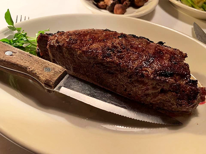 This NY Strip has the kind of perfect crust that makes you momentarily forget your table manners and consider picking it up with your hands.
