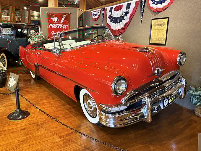 This fire-engine red 1954 Star Chief convertible isn't just transportation&mdash;it's rolling optimism from an era when America's confidence matched its chrome consumption. 