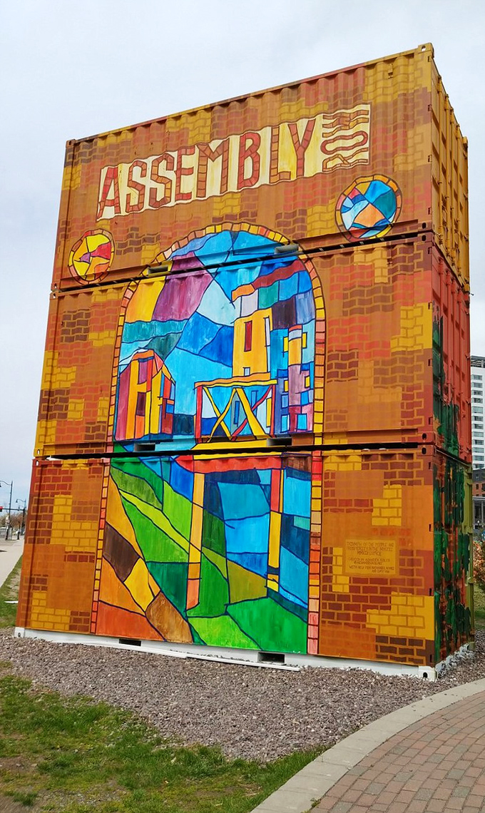 This artistic shipping container mural celebrates Assembly Row's industrial heritage with stained-glass-inspired colors that pop even on cloudy days.
