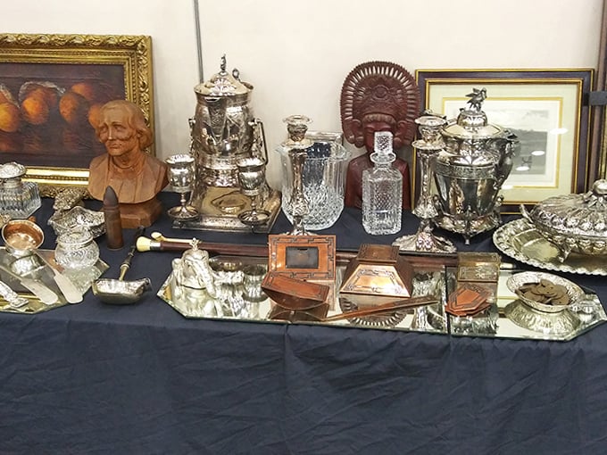 A bust of history surrounded by silver that's outlived its original owners. One person's downsizing becomes another's dining room centerpiece.