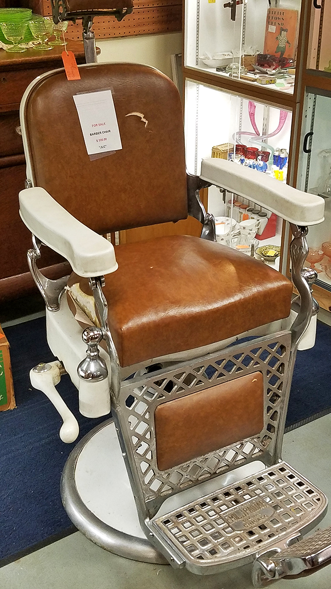 This vintage barber chair has heard more neighborhood gossip than any therapist's couch ever could.