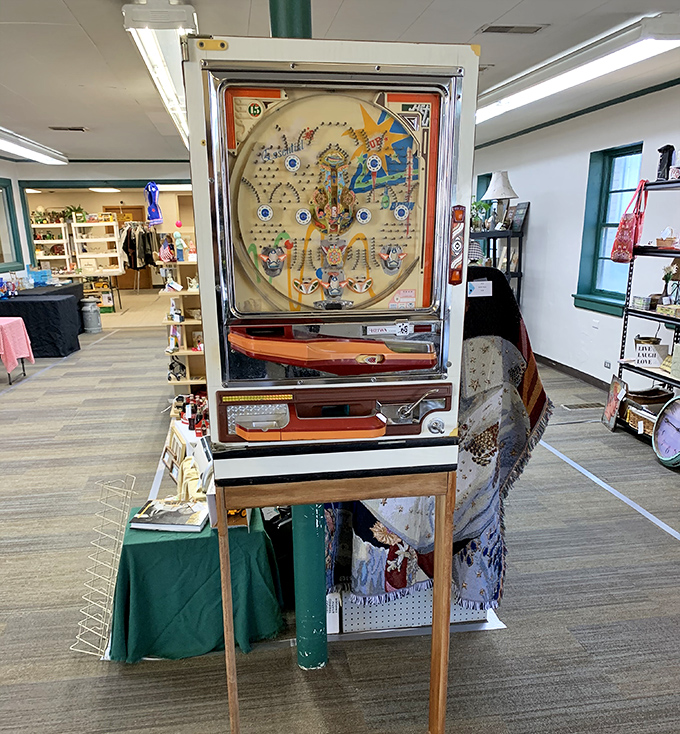 Vintage pachinko machine standing tall like a mechanical time traveler. When's the last time you saw one of these beauties outside a museum?