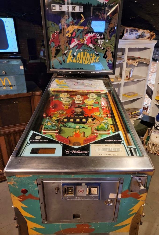 Klondike pinball machine standing tall, ready for action. In an age of digital gaming, these mechanical marvels remind us that quarters once ruled entertainment.
