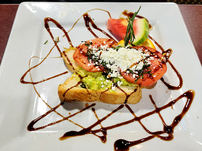 Avocado toast gets the Hash House treatment—artfully plated with a balsamic drizzle that would make Jackson Pollock proud. Breakfast as modern art.