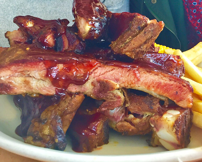 Fall-off-the-bone BBQ ribs glistening with sauce&mdash;the kind that make you thankful napkins were invented and etiquette rules are relaxed.