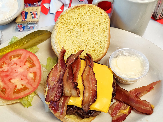 The bacon cheeseburger comes dressed for success with thick-cut tomatoes and enough bacon to make even breakfast jealous.