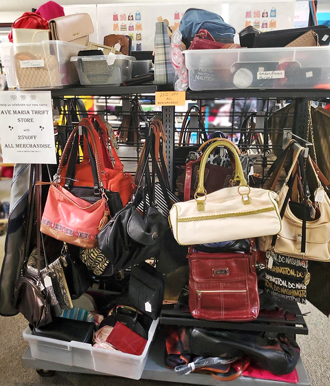 Handbag heaven! Designer dreams at down-to-earth prices. That red leather number is practically begging for a second chance.