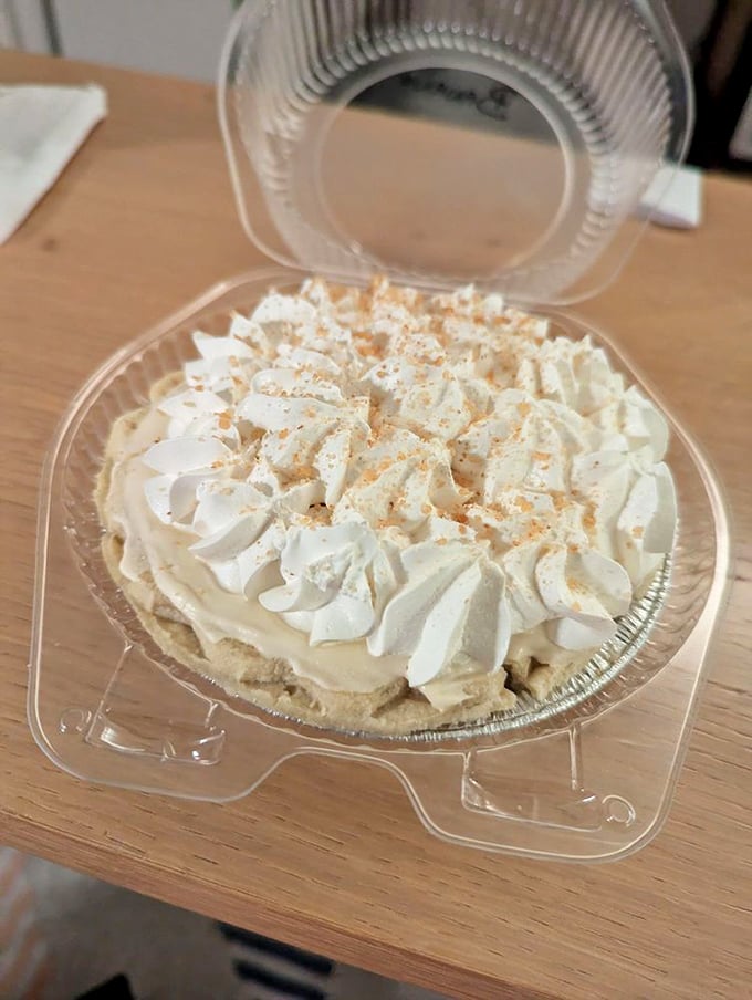 Whipped cream peaks like the Alps atop this cream pie, with a dusting of cinnamon that whispers, "You know you want me."