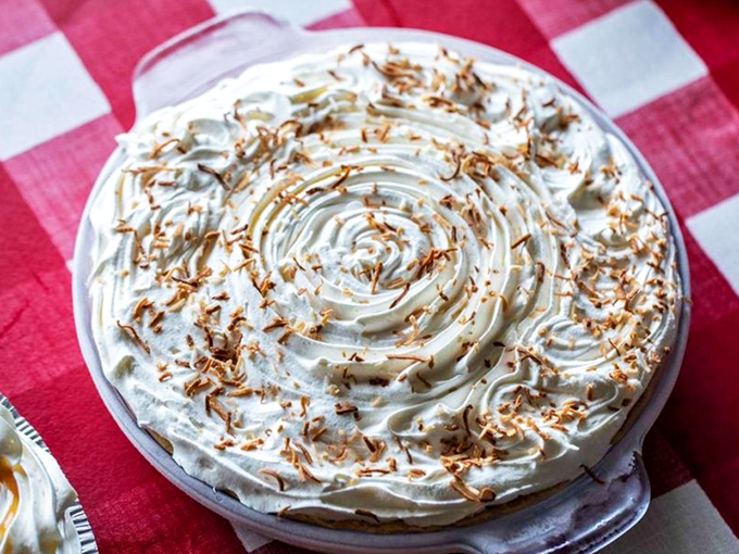 Banana cream pie with a perfect spiral of whipped cream and toasted coconut&mdash;architectural magnificence that somehow tastes even better than it looks.