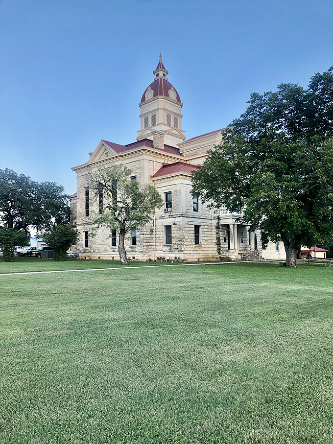 The Bandera County Courthouse stands as a limestone testament to Texas grandeur, where justice has been served with a side of Hill Country views since the 1800s.