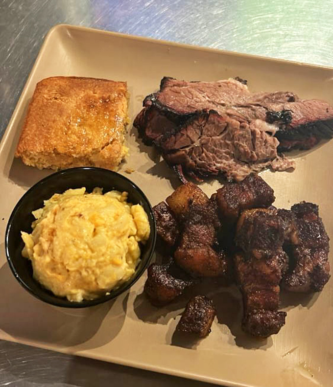 The BBQ combo plate &ndash; where decisions are unnecessary and joy is inevitable. Cornbread, mac and cheese, and meat three ways? Yes, please!