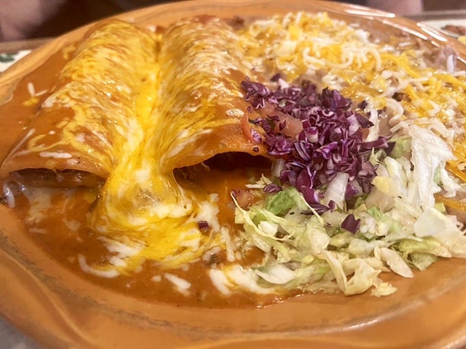 Enchiladas swimming in a sea of melted cheese and sauce&mdash;proof that sometimes the best things in life come completely smothered.