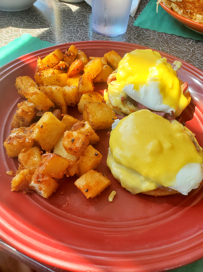 Eggs Benedict done right &ndash; golden hollandaise cascading over perfectly poached eggs. This is the breakfast equivalent of a standing ovation.