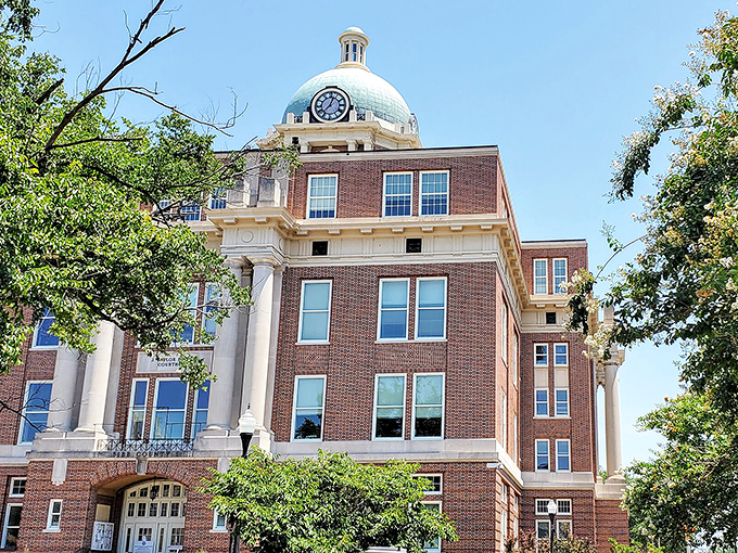 Bibb County Courthouse wears its dome like a distinguished hat, presiding over downtown with architectural authority.