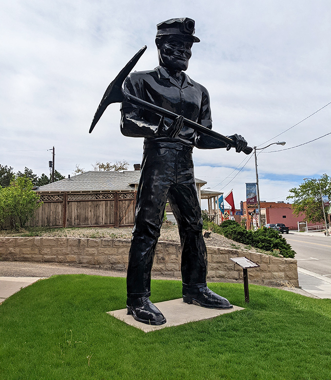 Big John stands tall, a coal miner frozen in bronze, silently telling the story of Helper's backbone industry with more eloquence than any history book could muster.