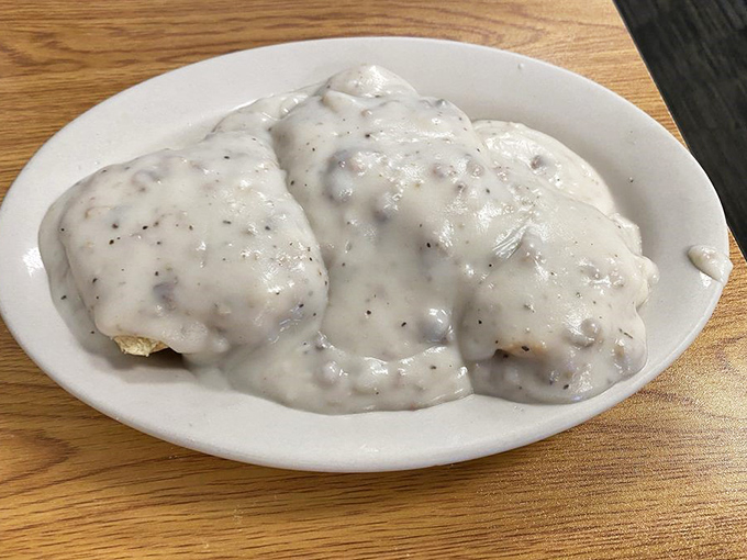 Biscuits drowning in gravy like they're at a spa &ndash; this is Southern comfort on a plate, no passport required.