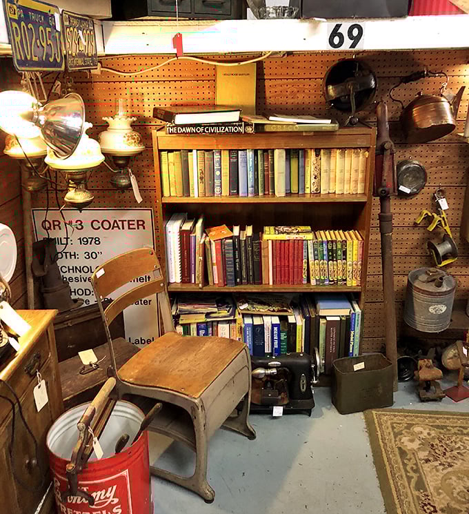 This isn't just a bookshelf; it's a time capsule where leather-bound wisdom meets vintage curiosities in a display that would make any library jealous.