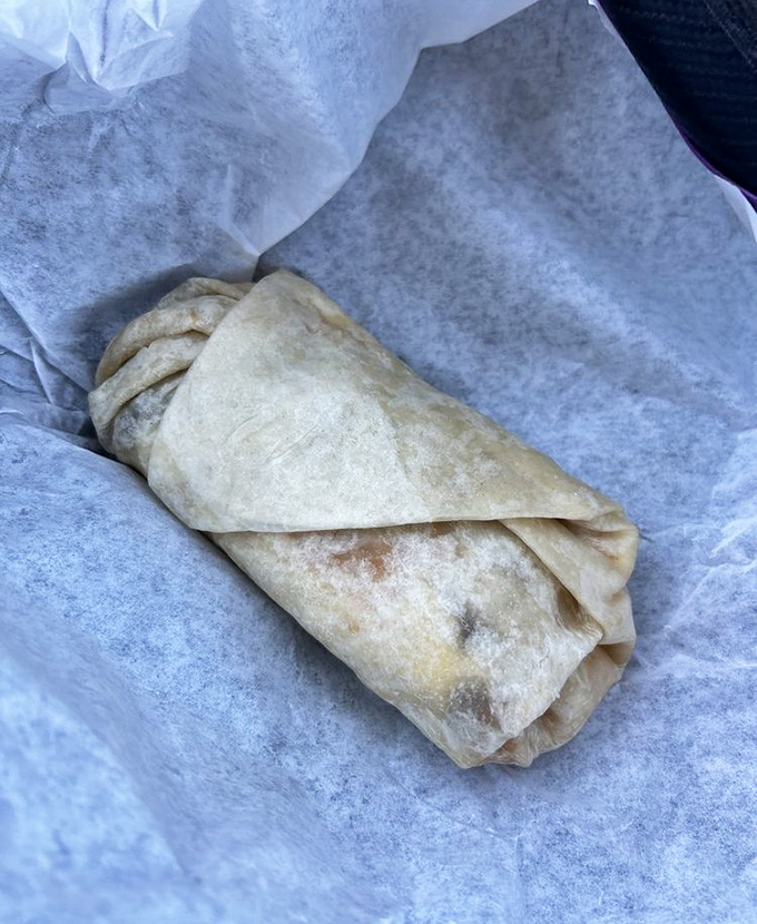 The breakfast burrito that launched a thousand road trips. Wrapped tight like a sleeping bag for eggs, cheese, and potatoes on their cozy morning adventure.