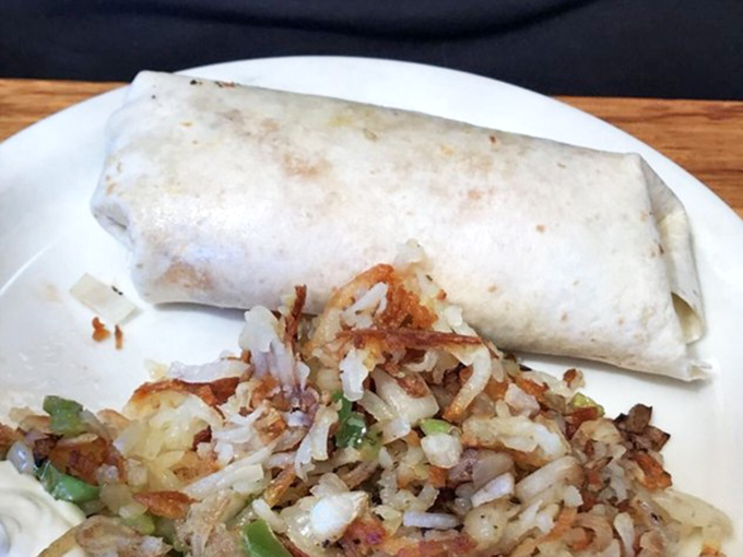 This breakfast burrito isn't just a meal, it's a commitment&mdash;a hand-held treasure chest stuffed with morning delights and crispy potatoes.