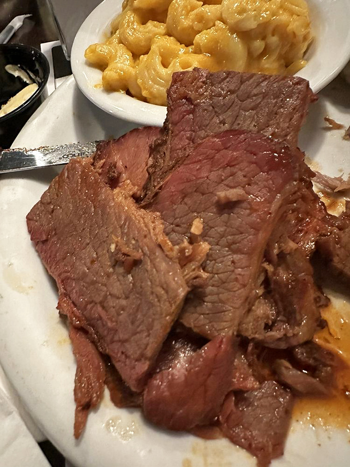 Brisket so tender it practically surrenders to your fork, paired with mac and cheese that would make your grandmother jealous.