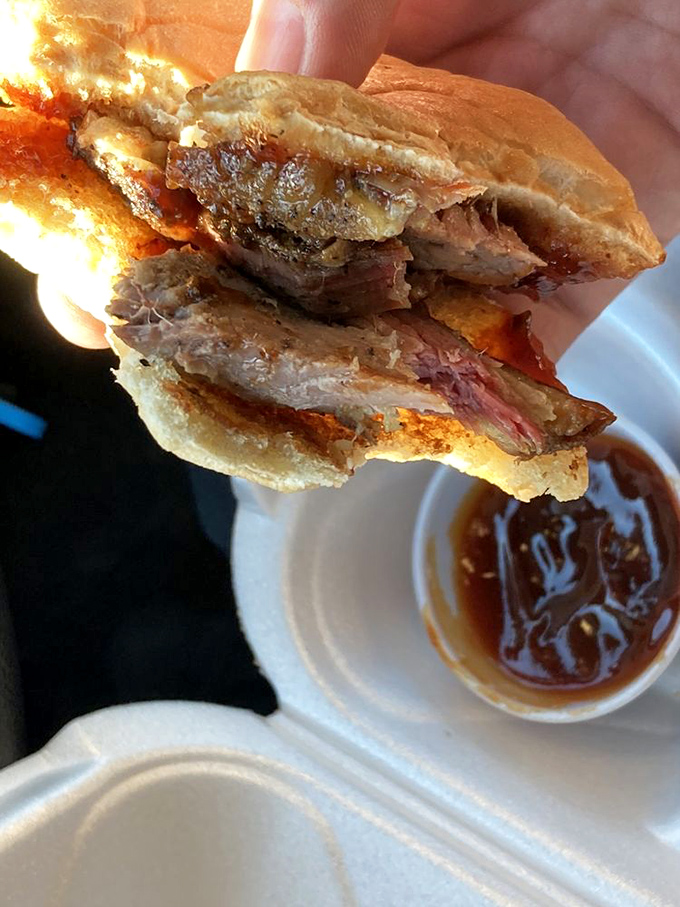 The brisket sandwich doesn't need fancy garnishes or artisanal bread&mdash;just meat that's been kissed by smoke until it surrenders all resistance.