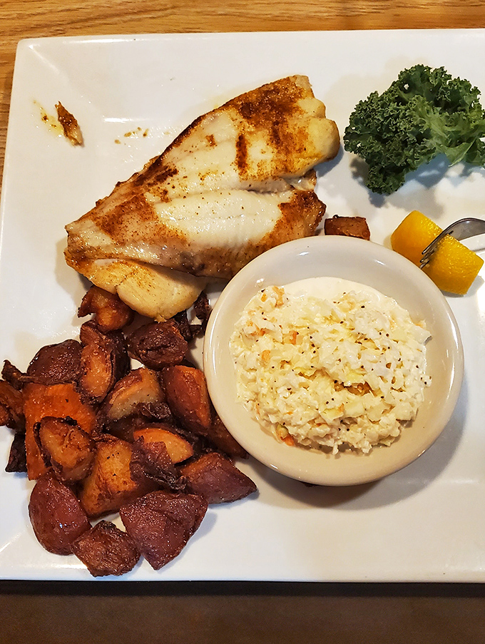 Simple yet sublime: this broiled flounder with roasted potatoes and coleslaw proves that sometimes the most straightforward preparation lets quality ingredients shine brightest.