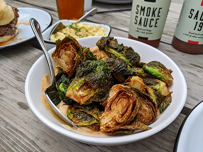 These Brussels sprouts have clearly been introduced to fire and smoke, transforming the once-dreaded vegetable into something your childhood self wouldn't recognize&mdash;but your adult self can't resist.