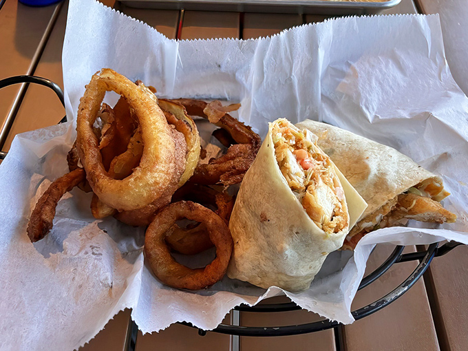 Crispy onion rings and a buffalo chicken wrap that brings just enough heat to wake up your taste buds without sending them into panic mode.